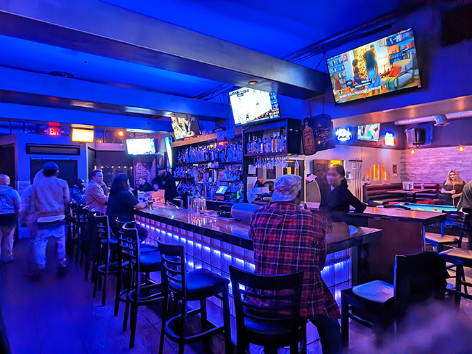 The blue glow of the Reno Room bar feels like stepping into a place where everybody might not know your name—yet.