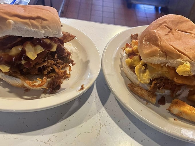These aren't just burgers – they're edible monuments to the art of comfort food, with cheese melting like sunshine on a perfect day.