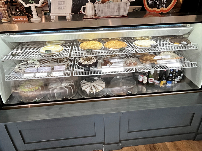 The dessert case – where willpower goes to die. Each pie and cake silently whispering, "You know you want me."