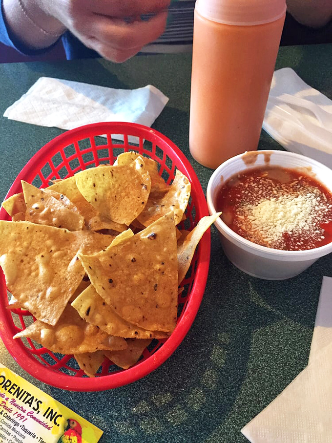 The chips arrive crisp and warm, ready for their inevitable plunge into salsa that strikes the ideal balance between tomato sweetness and chile heat.