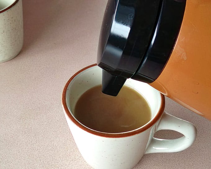 The coffee flows freely here, turning morning zombies into functioning humans one cup at a time.