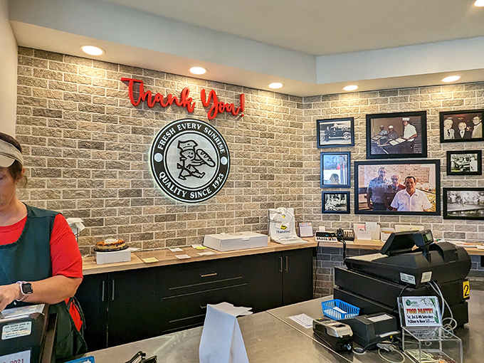 Behind this counter, magic happens daily. The "Thank You" sign is unnecessary—the gratitude flows from customers to bakers.