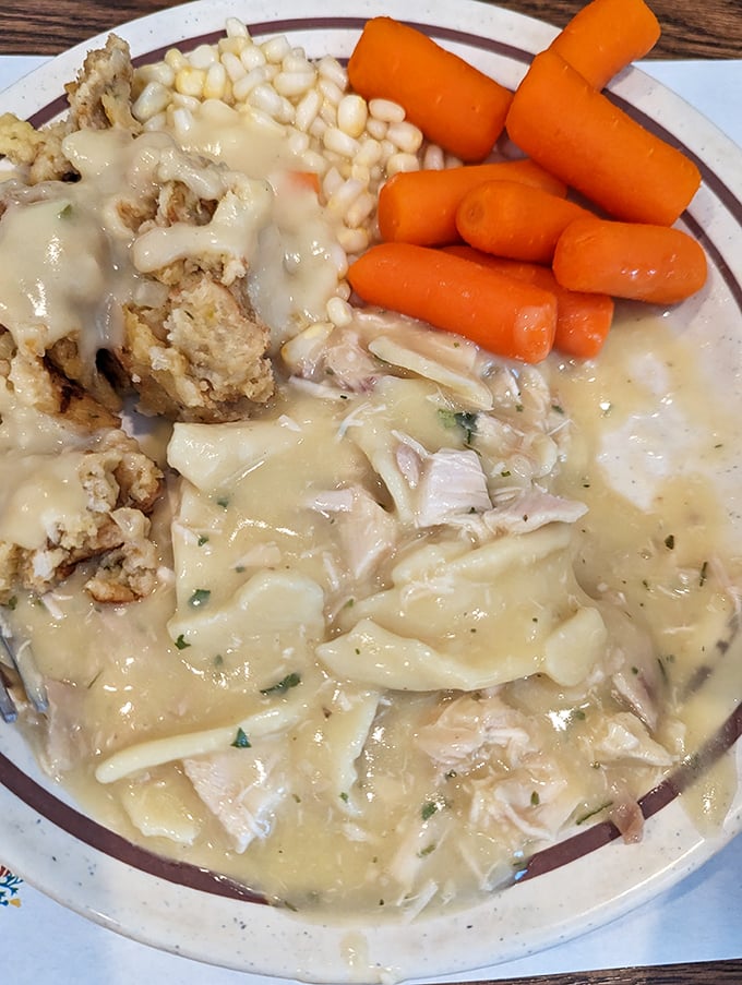 Pennsylvania Dutch chicken pot pie—not the kind with a crust hat, but a hearty stew with square noodles that stick to your ribs and your food memories.