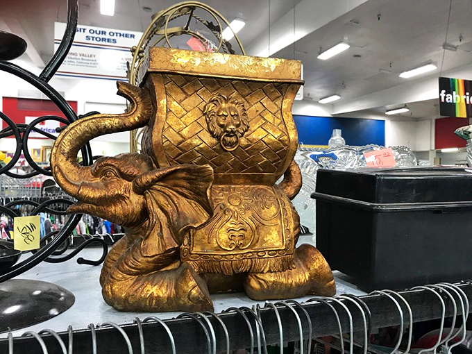 This golden elephant planter combines whimsy with function, ready to hold plants or simply spark delightful conversations.