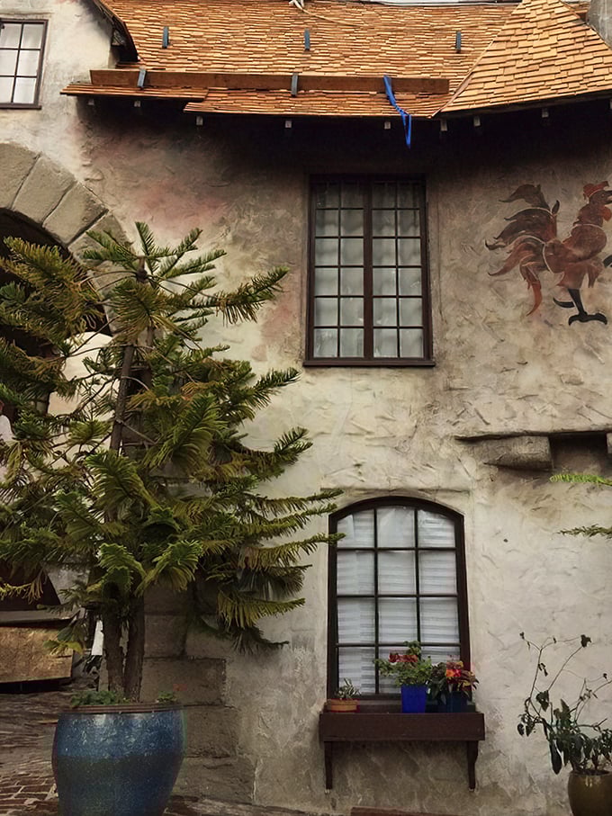 Decorative symbols and artistic touches prove that even fairy-tale villages need a little mystical flair. 