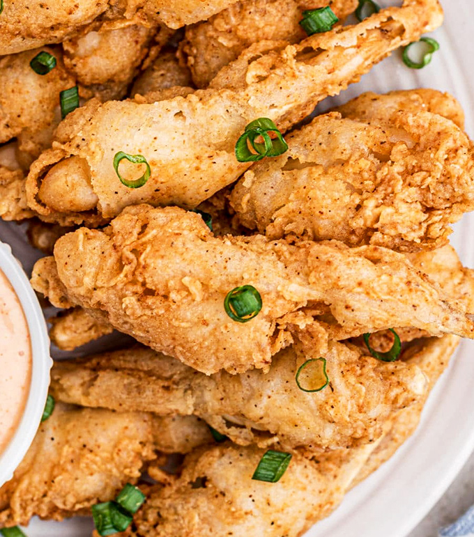 These aren't just any fried delicacies—they're conversation starters, flavor bombs, and the reason you'll be planning your return visit before leaving.