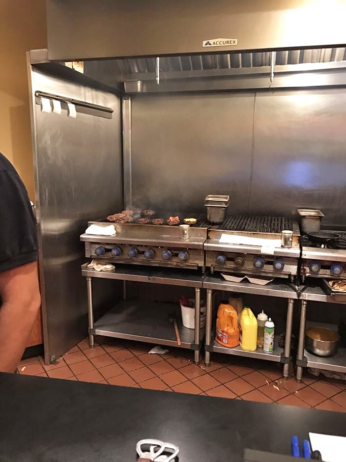 Where the magic happens—a no-nonsense kitchen that proves great food doesn't require fancy equipment, just skill and passion.