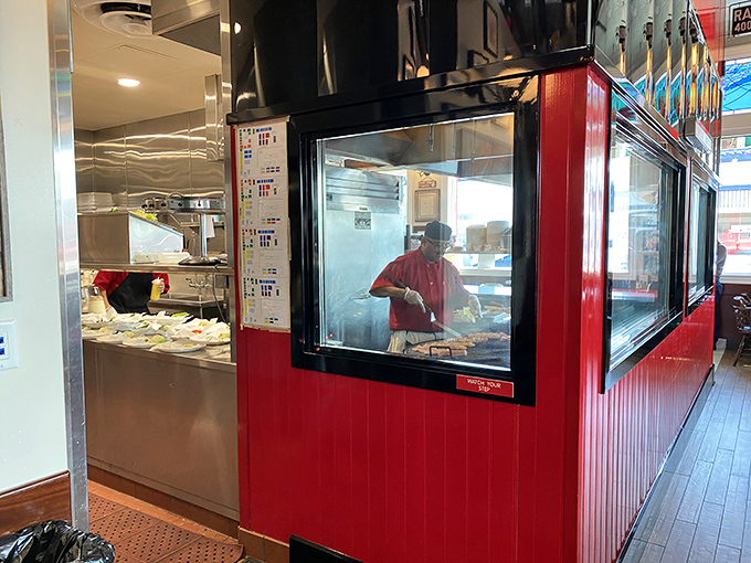 Behind-the-scenes kitchen magic where skilled hands transform ocean bounty into culinary masterpieces worth the wait.