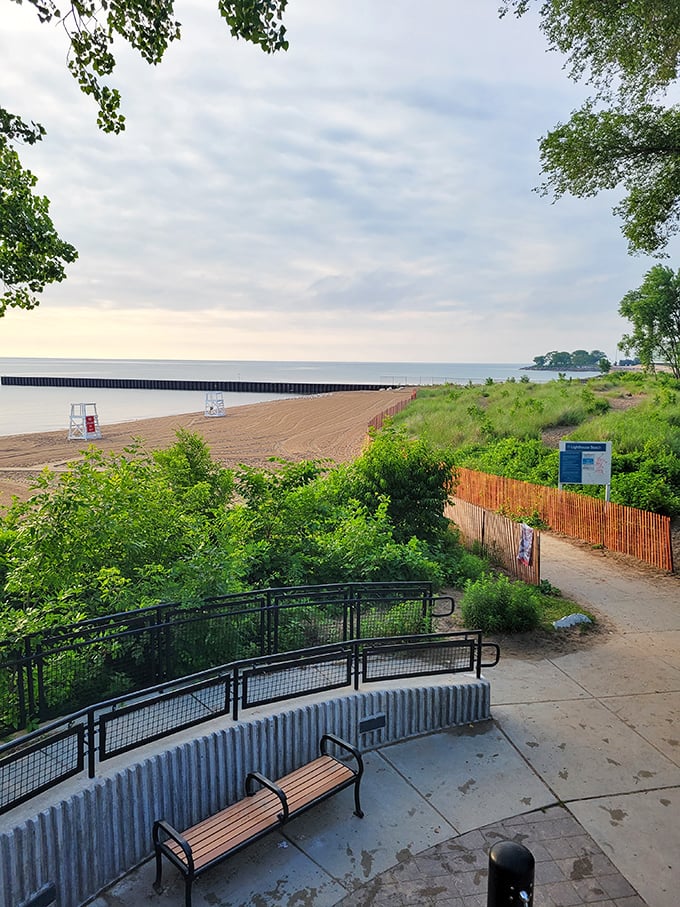 Just steps from the lighthouse, Lake Michigan stretches to the horizon—proof that the Midwest has its own version of coastal living.