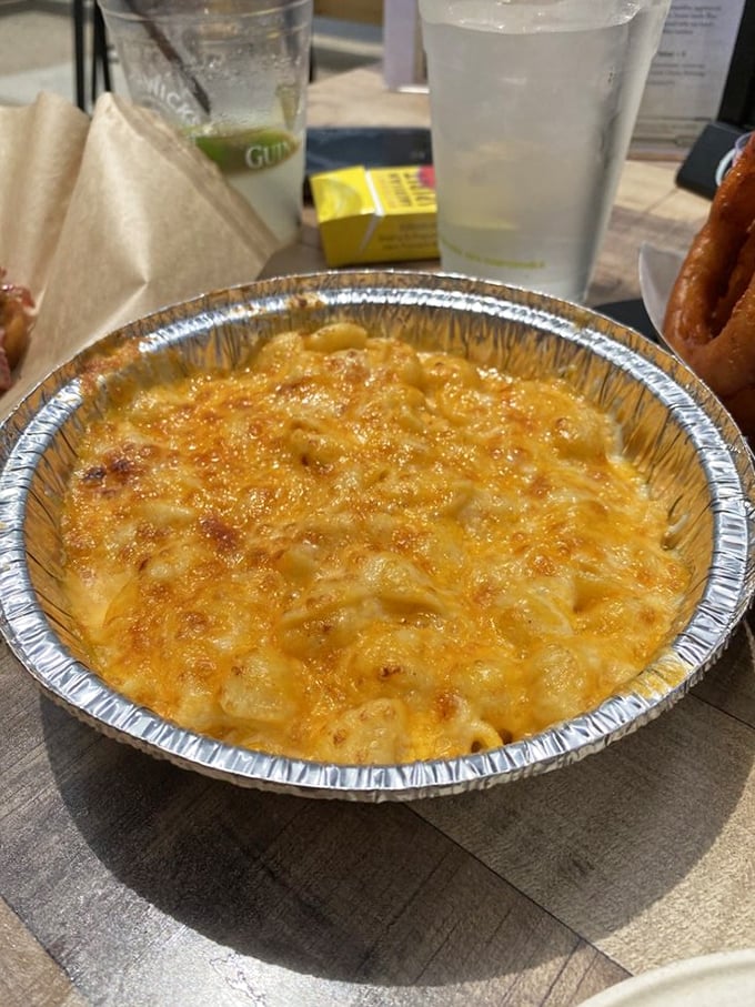 Mac and cheese that's achieved celebrity status—a bubbling cauldron of molten goodness that makes you forget all your adulting responsibilities.