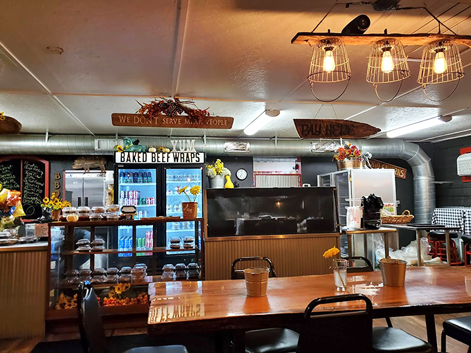 Every detail—from the exposed ductwork to the wooden tables—creates an atmosphere where calories don't count and sauce stains are badges of honor.
