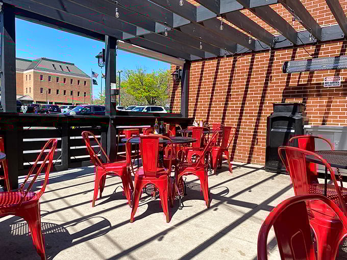 Red chairs under blue skies—the outdoor patio offers a perfect stage for the main character of your day: lunch.