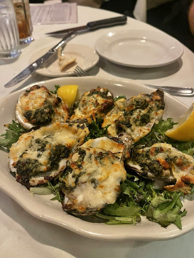 Oysters Rockefeller dressed to the nines—when seafood crashes the steakhouse party beautifully.