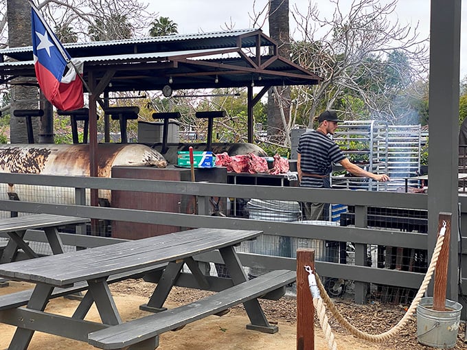 Where the magic happens—custom smokers tended with the focused dedication of classical musicians performing a complicated symphony of smoke and fire.