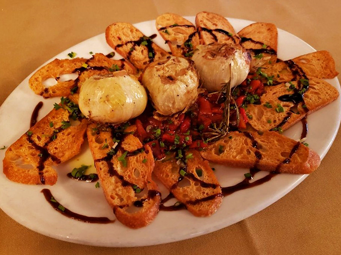 Roasted garlic and grilled bread—the opening act that sets the stage for the culinary concert to follow.