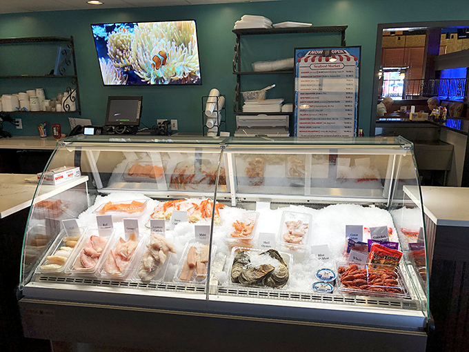 This seafood case isn't just displaying ingredients—it's showcasing treasures from the deep that would make Neptune himself place a to-go order.