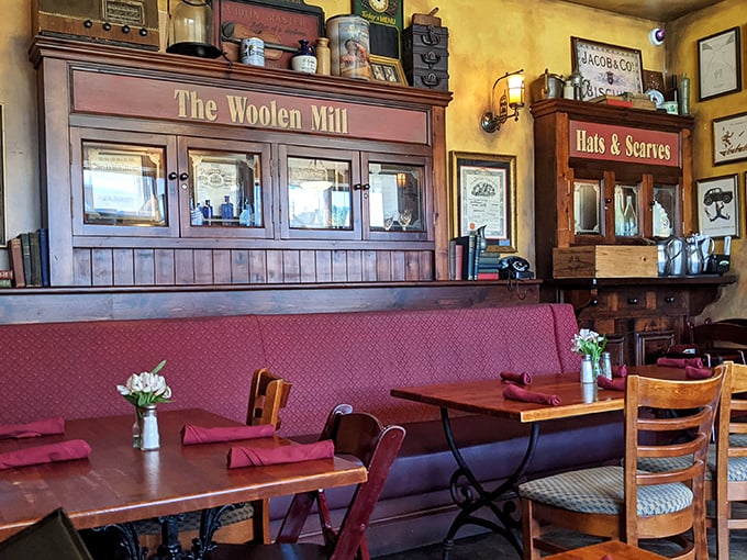 That cozy booth in the corner with "The Woolen Mill" sign above—where first dates become anniversaries and strangers become regulars.