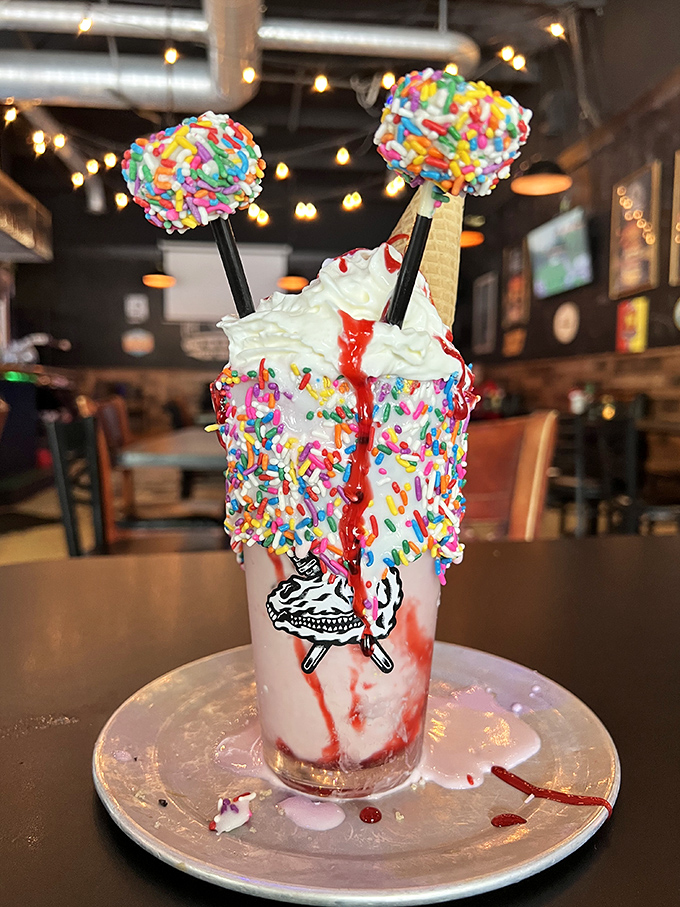 Dessert or work of art? This sprinkle-encrusted shake topped with cookie pops isn't just a treat—it's an Instagram celebrity waiting to happen.