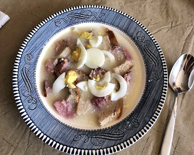 White borscht with kielbasa and eggs – a soup so hearty it's practically a family reunion in a bowl.