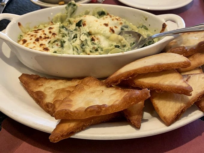 This bubbling spinach and artichoke dip isn't just an appetizer—it's a warm, cheesy commitment to starting your meal right.