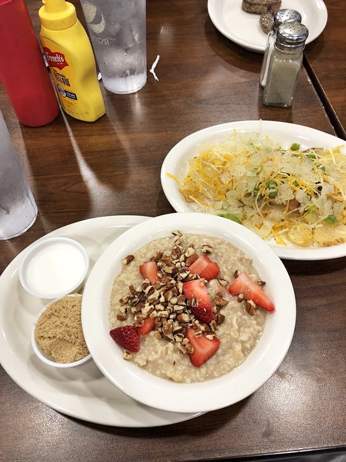 Oatmeal elevated from punishment to pleasure. Those strawberries and nuts aren't just toppings—they're jewelry for your breakfast.