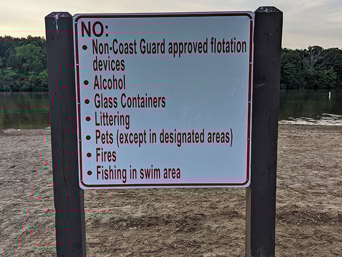 The party pooper of park signs. Every paradise needs its rules, but the lake beyond this list of "nos" offers enough "yeses" to more than compensate.