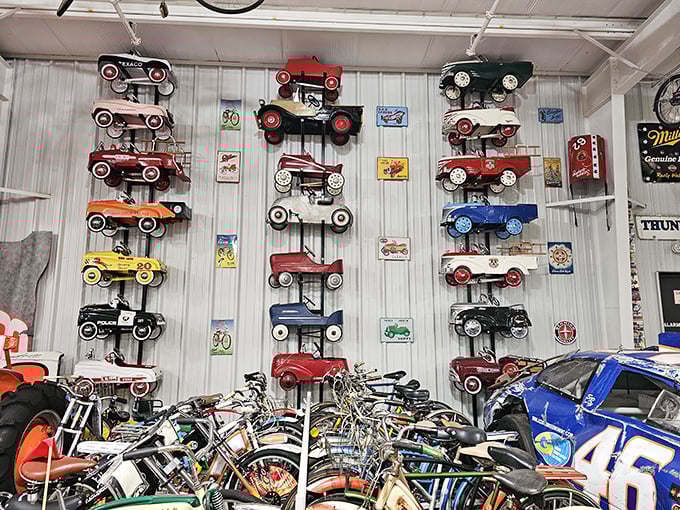 This wall of vintage pedal cars showcases childhood dreams from across generations – proving some toys are too special to outgrow.