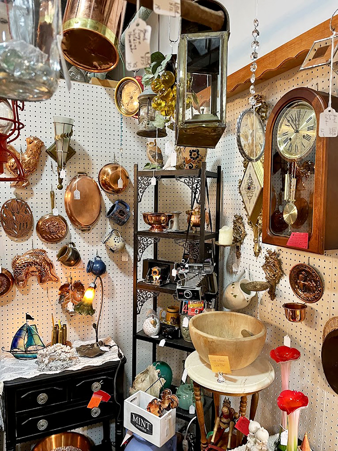 A pegboard paradise of copper, clocks, and curiosities—where every inch of wall space tells a different story.