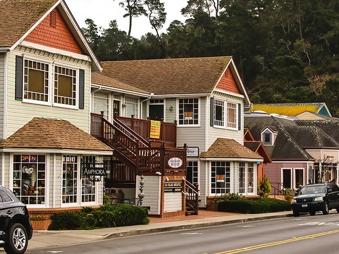 The village's multi-level shops cascade down Main Street like a retail waterfall, each one promising treasures you didn't know you needed.