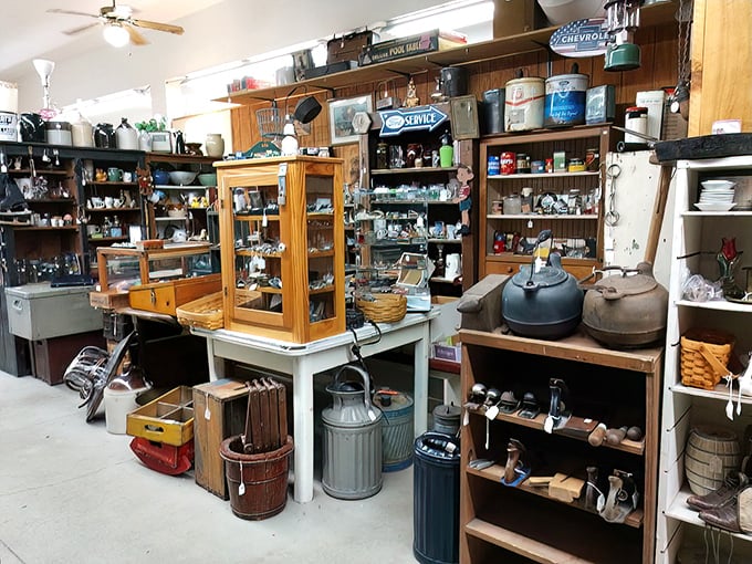 A collector's paradise of galvanized glory—milk cans, buckets, and watering cans that worked hard on Ohio farms. Rustic utility transformed into rustic chic.