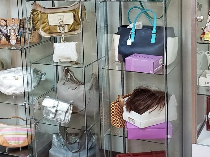 Designer handbags behind glass—like a museum exhibit, except you can actually take these treasures home without setting off alarms.