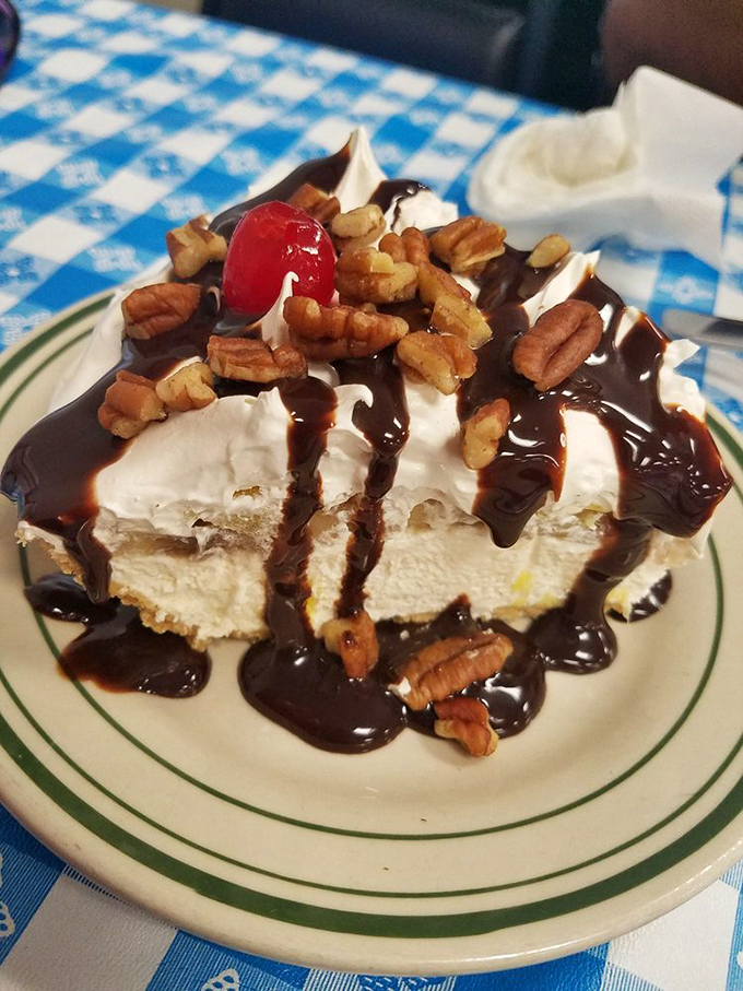 Not all heroes wear capes—some come topped with chocolate sauce, whipped cream, and pecans in a dessert that demands to be photographed first.