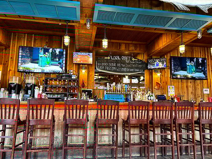 The bar isn't just serving drinks—it's serving possibilities. Those blue ceiling panels add a touch of sky even when you're inside.