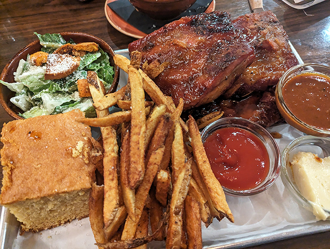 A barbecue platter that doesn't mess around—the kind of meal that requires both a knife and fork and several napkins strategically deployed.