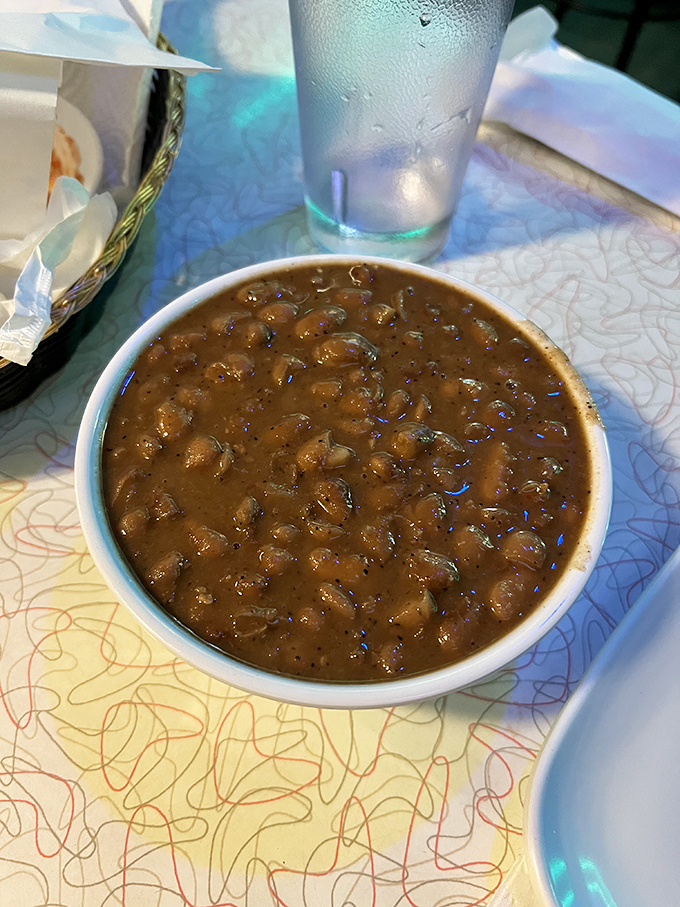 A humble bowl of beans that's secretly plotting to be the highlight of your meal. Slow-cooked to perfection, it's comfort in its purest form.