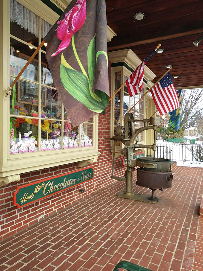 The front porch – where vintage charm meets homemade chocolate promises, complete with an antique kettle that's seen sweeter days.