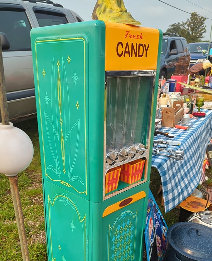 Retro candy machine promising sugary nostalgia by the handful. This turquoise beauty once dispensed happiness for pennies in some forgotten diner. 