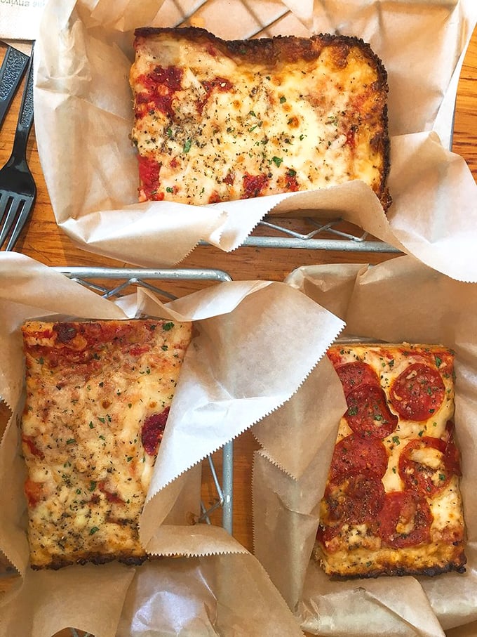These pizza slices aren't just lunch—they're a masterclass in proper cheese-to-sauce ratio. That pepperoni one is practically winking at you.