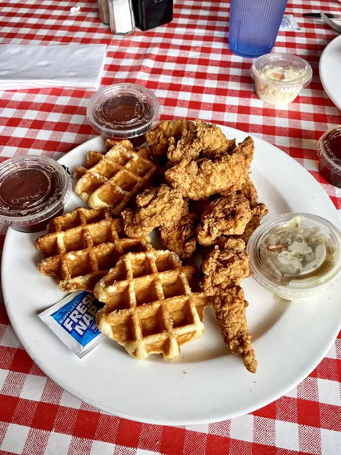 Chicken and waffles: the food equivalent of a perfect marriage. Sweet meets savory in a relationship counselors would approve of.