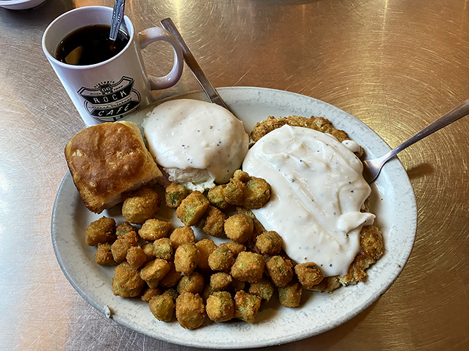 Chicken fried steak swimming in country gravy with a side of golden tots—heart surgeons hate this one simple meal!