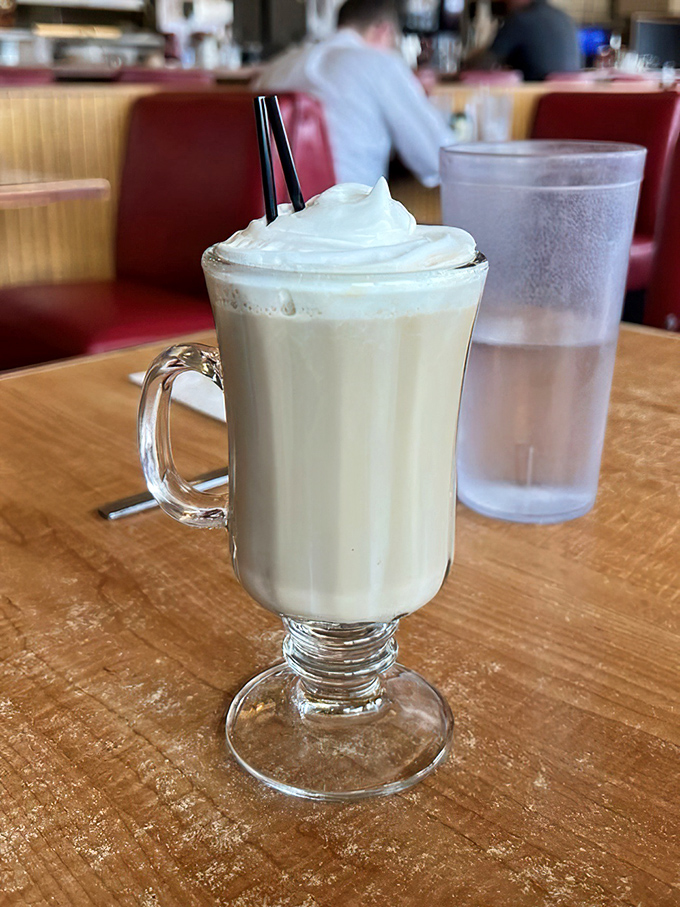 This isn't just coffee with whipped cream—it's morning's dessert, a reward for surviving another day of adulting.