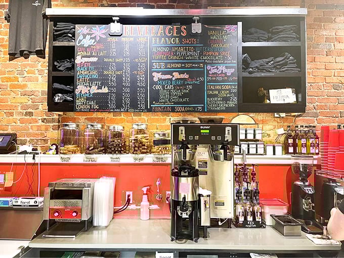 Behind this coffee bar, baristas work their magic, transforming beans into liquid gold—the perfect companion for that slice of cheesecake you're eyeing.
