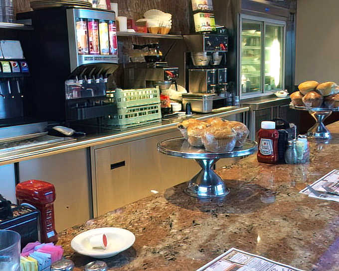 The counter area – command central for coffee refills and pastry temptations, where regulars exchange local gossip over steaming mugs.