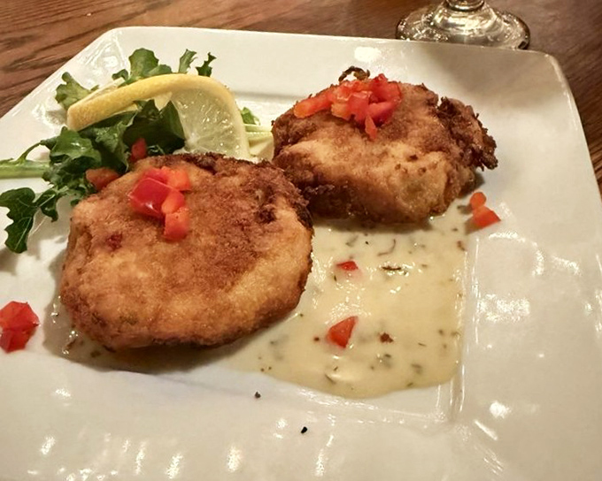 Crab cakes with the perfect golden crust—like tiny edible treasure chests filled with delicate seafood instead of gold doubloons.
