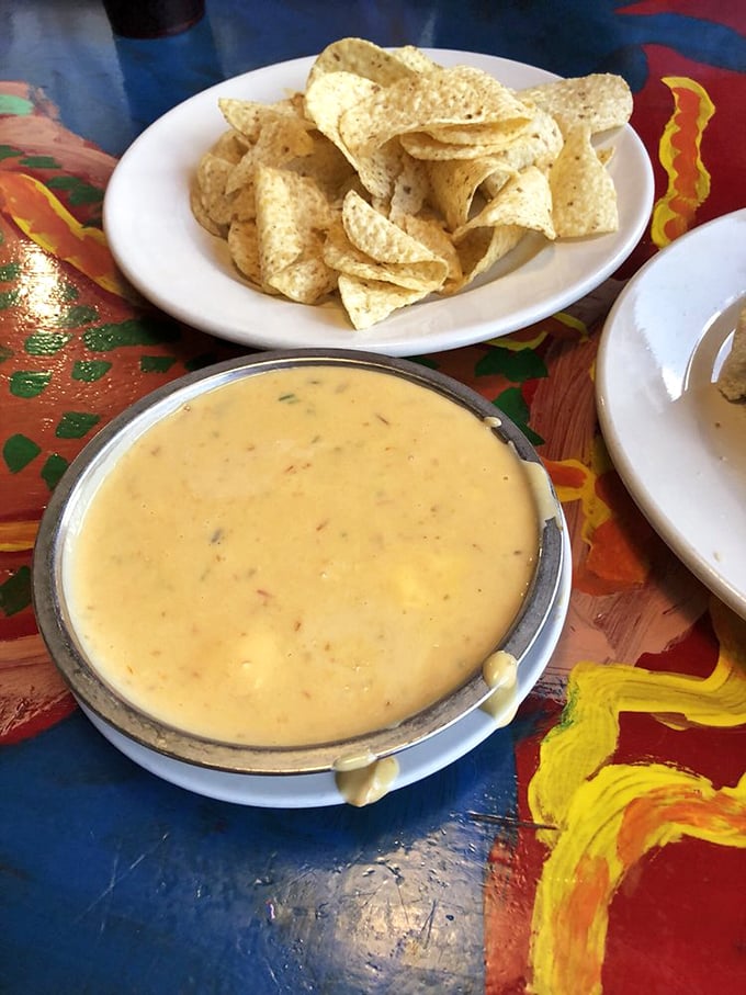 This creamy crab dip isn't just an appetizer – it's the opening act that threatens to upstage the headliner if you're not careful.