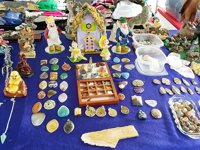 Crystals, seashells, and mystical figurines create a tabletop universe where spiritual seekers and beach decor enthusiasts find common ground. 