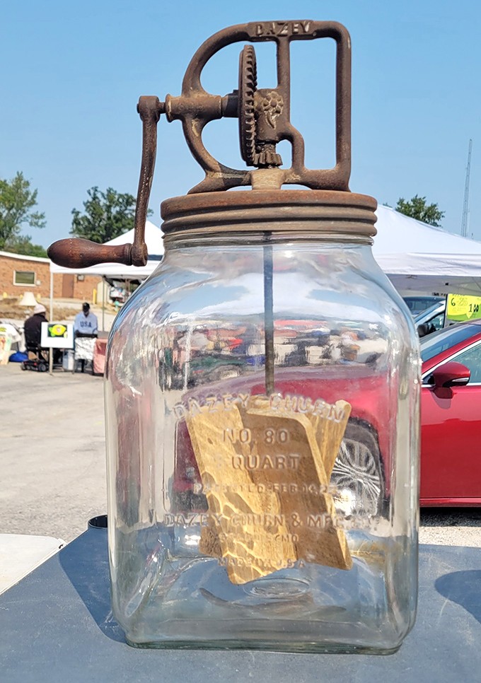 A Dazey butter churn that's survived a century stands ready for its next chapter. History with a handle, just waiting to be cranked.