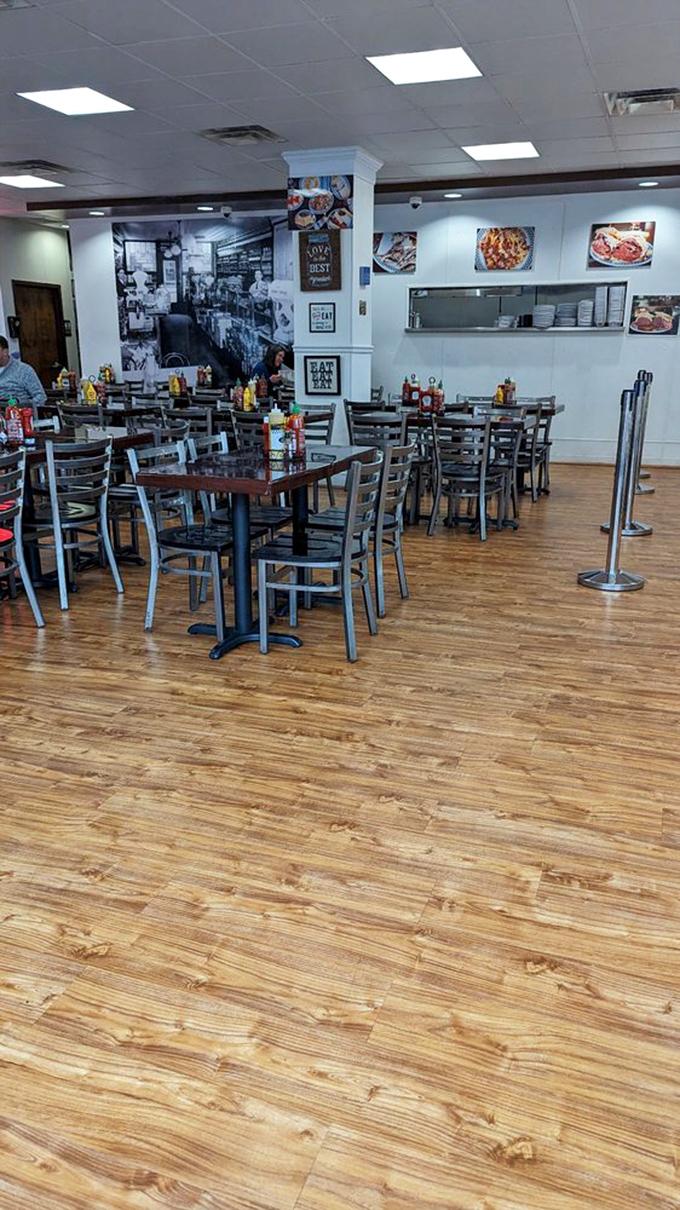 In this warm, wood-floored sanctuary of sandwich worship, diners commune with oversized portions under the watchful eyes of condiment bottles.
