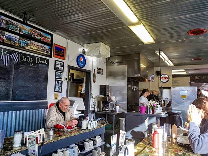 Where locals and travelers break bread together. The morning light streaming in makes everyone look like they're in a Norman Rockwell painting.