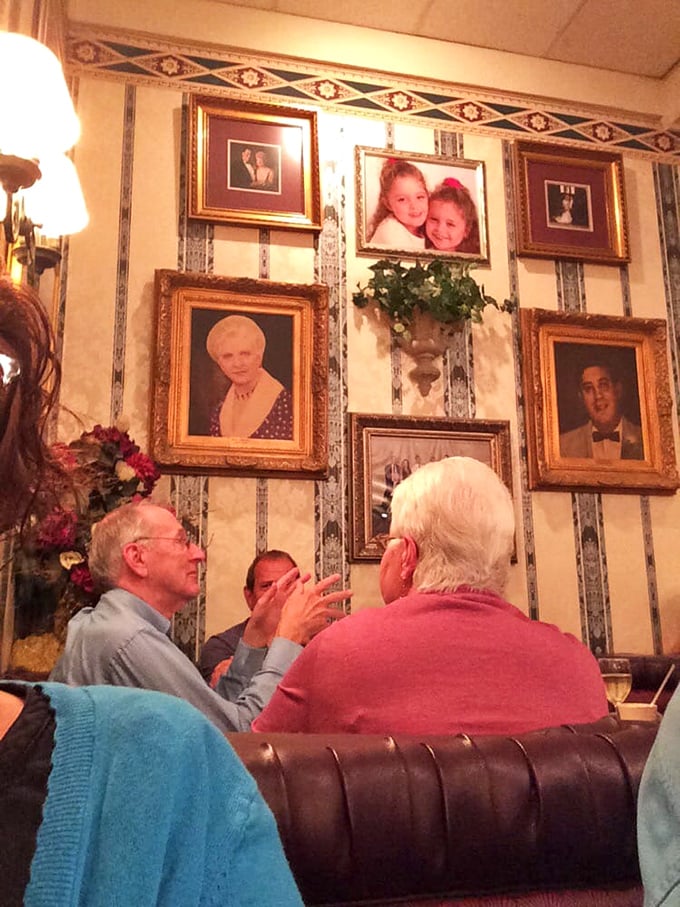 Multi-generational dining at its finest. The walls aren't just decorated with photos—they're witnessing new memories being made every day.